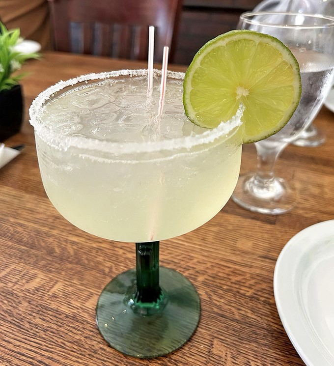 A proper margarita with salt-rimmed sophistication &ndash; the perfect cooling companion to the rich, pressed sandwiches.