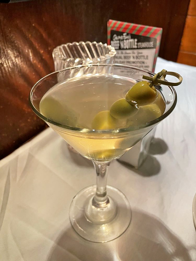 The classic martini&mdash;three olives standing at attention like tiny soldiers guarding the gateway to a perfectly civilized evening.