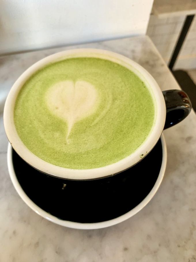 A matcha latte with a heart that says, "I'm not just a trendy beverage&mdash;I'm your new morning relationship status: It's complicated but worth it."