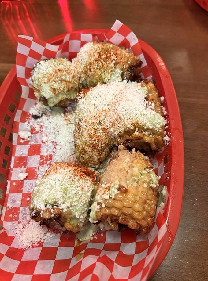 Elote gets the Sisters and Brothers treatment&mdash;sweet corn elevated with creamy sauce, cheese dust, and a sprinkle of spice magic.