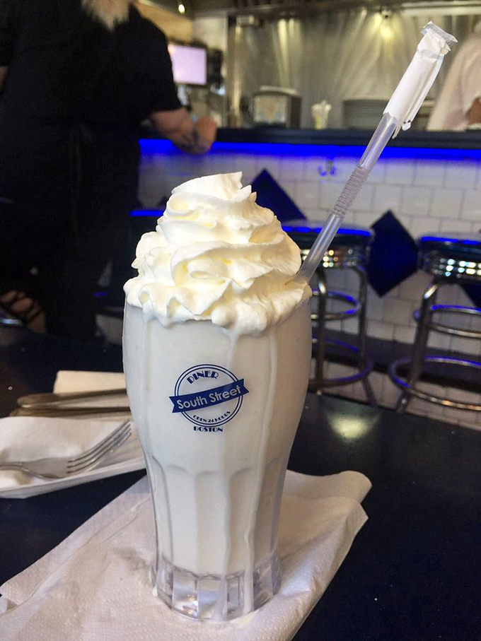 This isn't just a milkshake—it's a frothy tower of vanilla bliss that demands respect, a spoon, and possibly an Instagram moment.