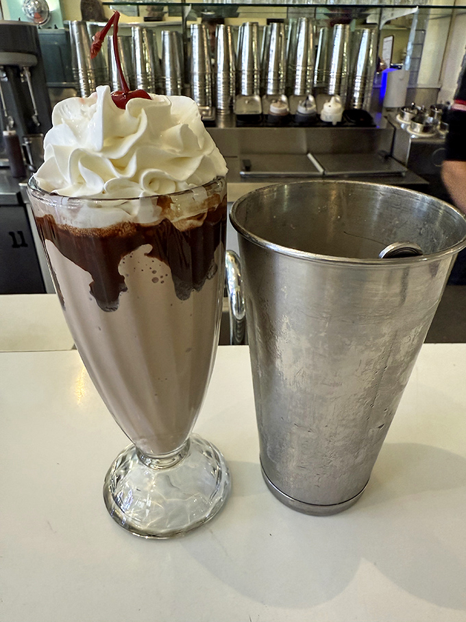 The chocolate shake arrives with its metal mixing cup sidekick &ndash; essentially giving you a milkshake and a half, because sometimes more is exactly enough.