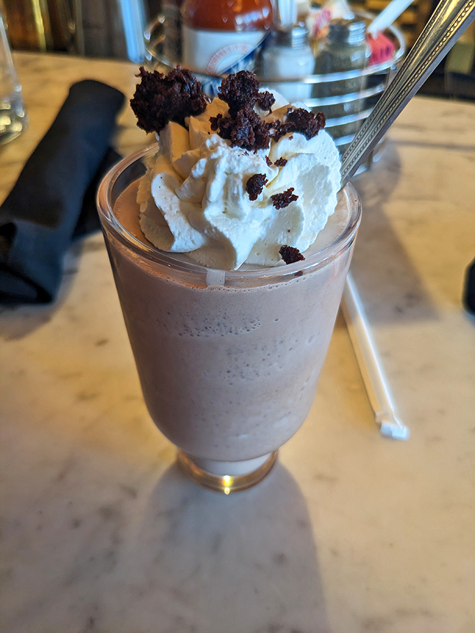 A milkshake that understands excess is sometimes exactly right&mdash;topped with whipped cream and brownie chunks, it's dessert masquerading as a beverage.