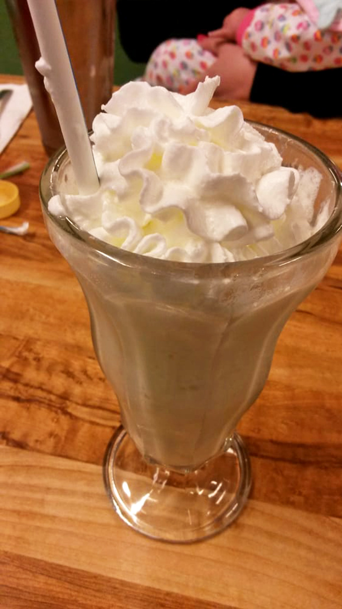 Whipped cream mountains atop this milkshake create the kind of dessert that makes adults feel like kids again.