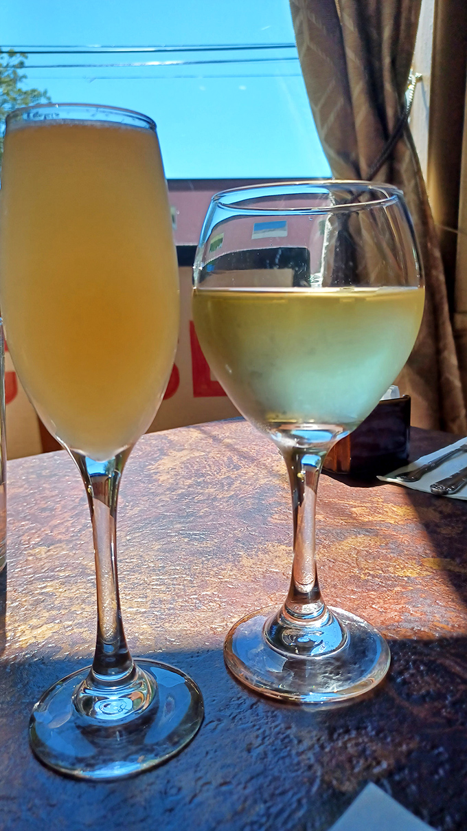 Morning mimosas and wine catch the light like liquid sunshine&mdash;because sometimes breakfast deserves a celebratory toast.