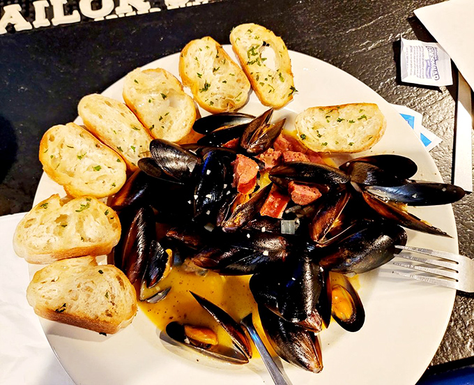 These mussels have traveled farther than most Civil War soldiers, arriving at your table surrounded by garlic-kissed bread for soaking up the sea.