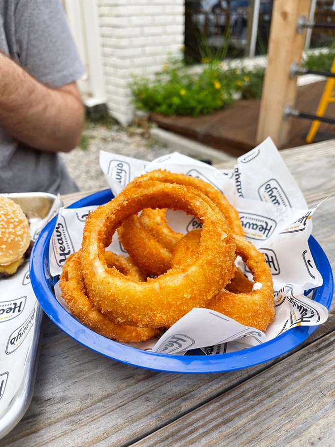 Golden halos of happiness. These onion rings aren't just a side&mdash;they're the supporting actor that steals the show.
