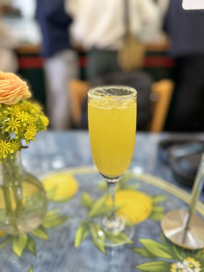Liquid sunshine in a champagne flute. This mimosa isn't just a brunch cocktail&mdash;it's morning optimism in a glass, surrounded by California's floral bounty.