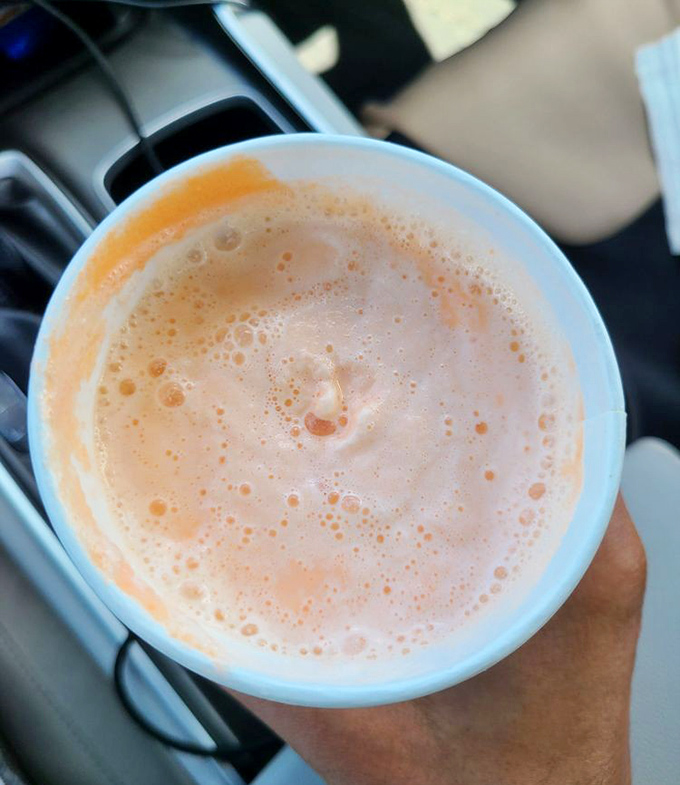 An orange cream shake that tastes like summer vacation in liquid form &ndash; thick enough to require serious straw strength but worth every sip.