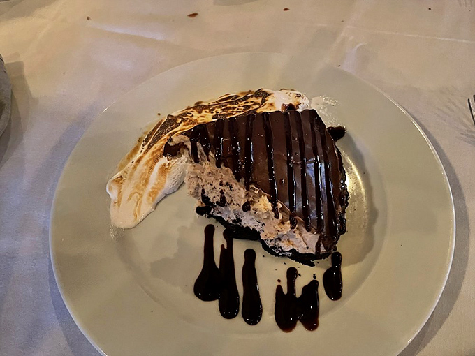 Dessert that makes you pause mid-conversation&mdash;layers of chocolate decadence with artistic sauce drizzles that would make Jackson Pollock proud.