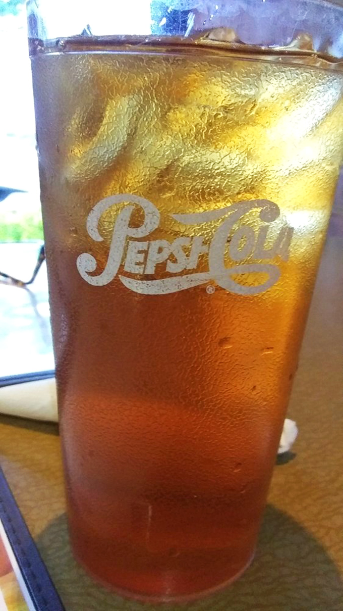 Even the iced tea comes with a side of Southern hospitality, condensation beading on the glass like it's working up a sweat in the Carolina heat.