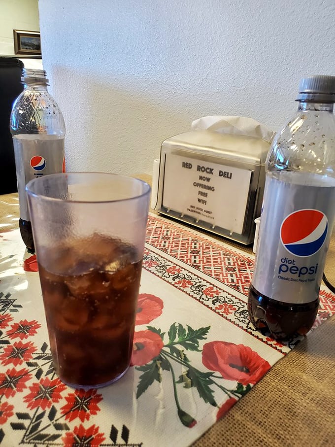 Even the soda feels special here, served on traditional embroidered tablecloths that remind you: details matter in the pursuit of deliciousness.