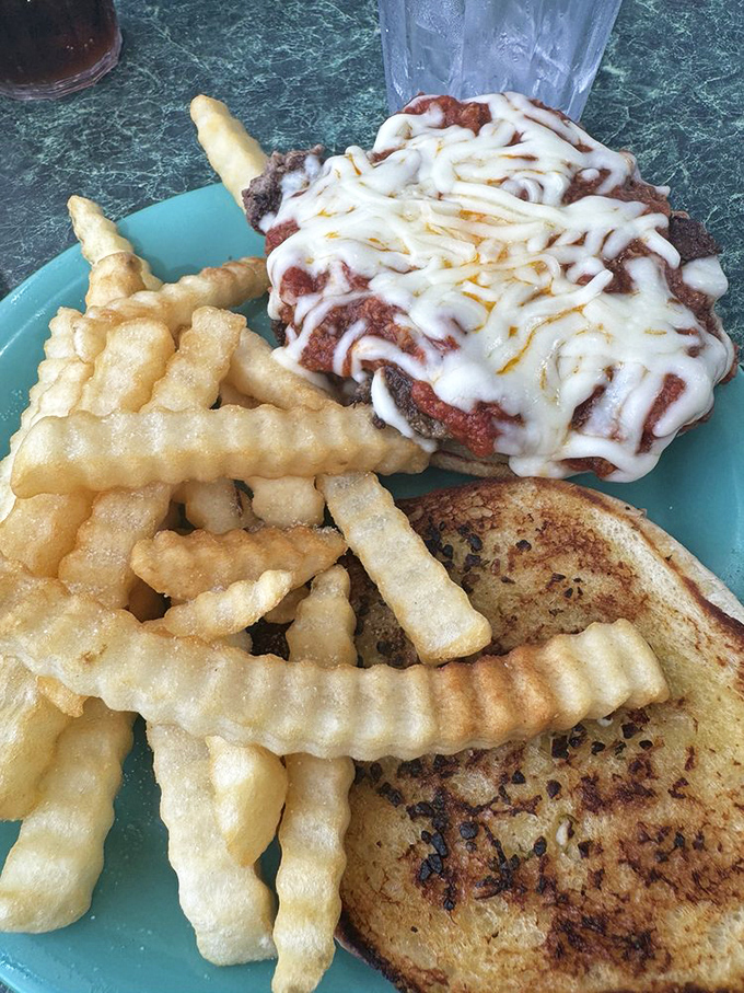 This isn't just a sandwich&mdash;it's an architectural marvel of melted cheese, crispy fries, and toasted bread that demands both respect and napkins.