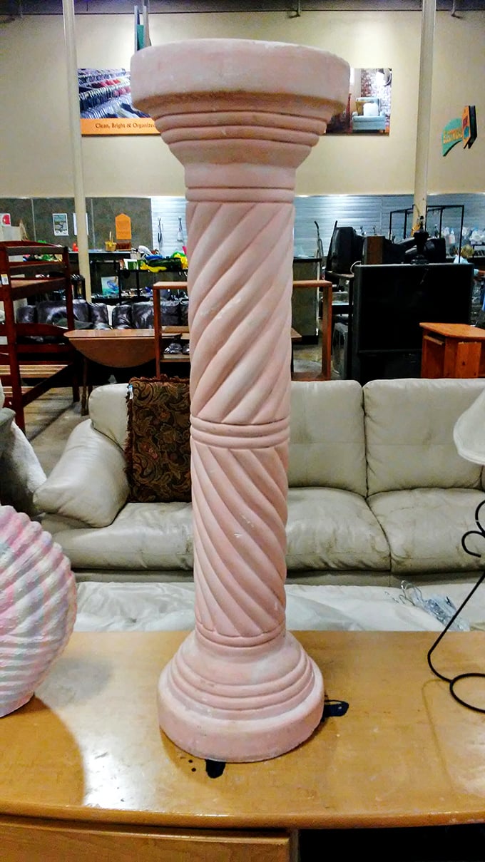 This decorative column isn't just home decor—it's a conversation piece that asks, "Who needs Architectural Digest when you have Thrift Town?"