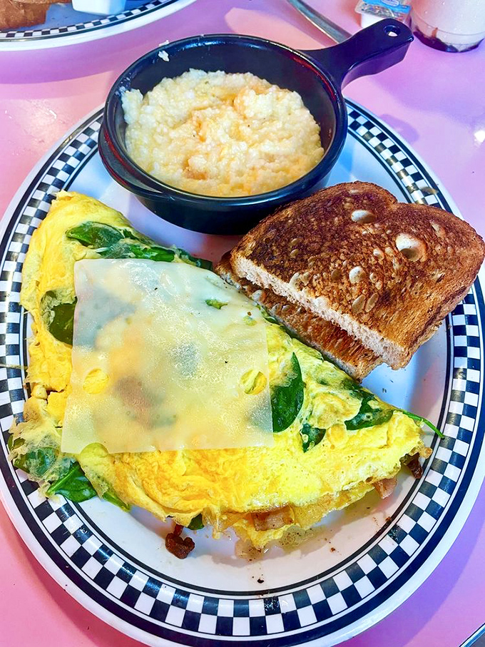 Not just an omelette, but a work of art. When spinach and cheese get together, they don't just date&mdash;they get married on your plate.