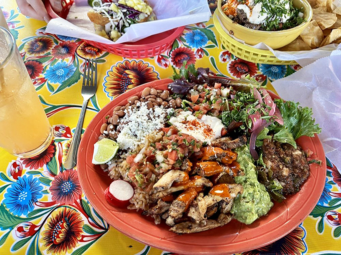 A fiesta on a plate where rice, beans, meat, and all the fixings come together like the world's most delicious family reunion.