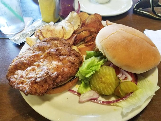 The pork tenderloin sandwich &ndash; a Midwestern monument to the beautiful art of taking something simple and making it gloriously excessive.