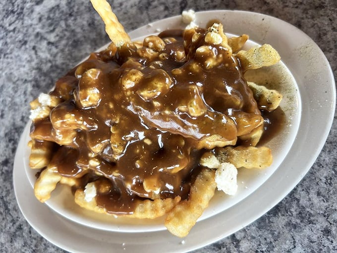 Gravy-drenched fries that laugh in the face of diet plans. Some comfort foods are worth every delicious calorie and subsequent treadmill minute.