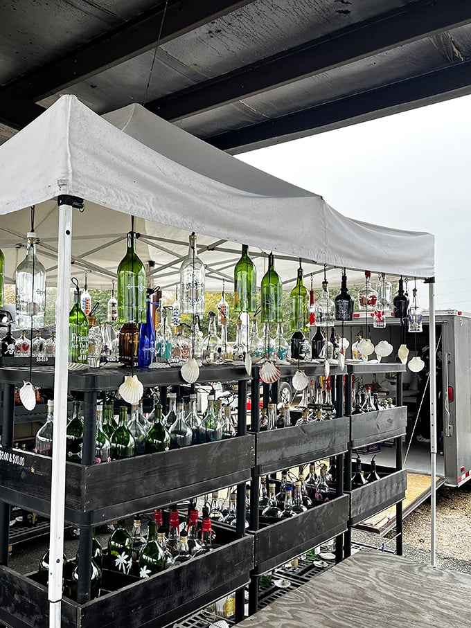 Recycled bottles transformed into hanging art. Like a glass symphony suspended in midair&mdash;someone's trash becomes everyone's treasure.