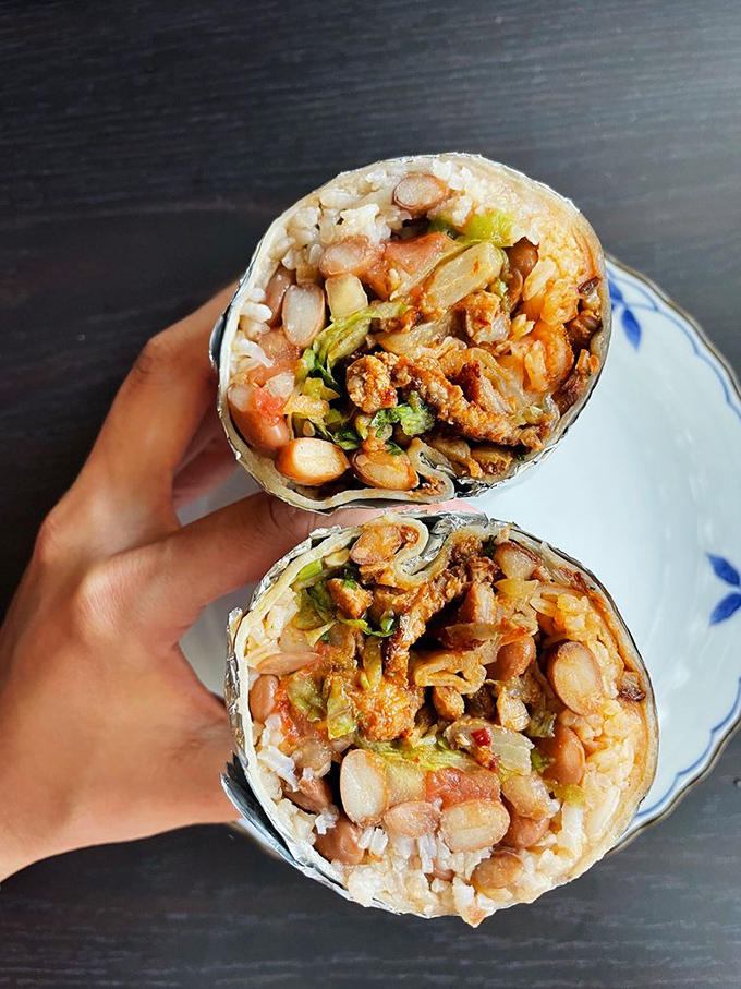 Bean there, done that? Not like this! The perfect distribution of beans, rice, and seasoned meat make this burrito cross-section worthy of a food museum.