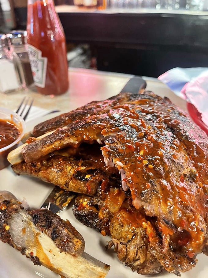 Fall-off-the-bone ribs glistening with sauce that would make even the most dedicated burger fan consider a temporary change of allegiance.