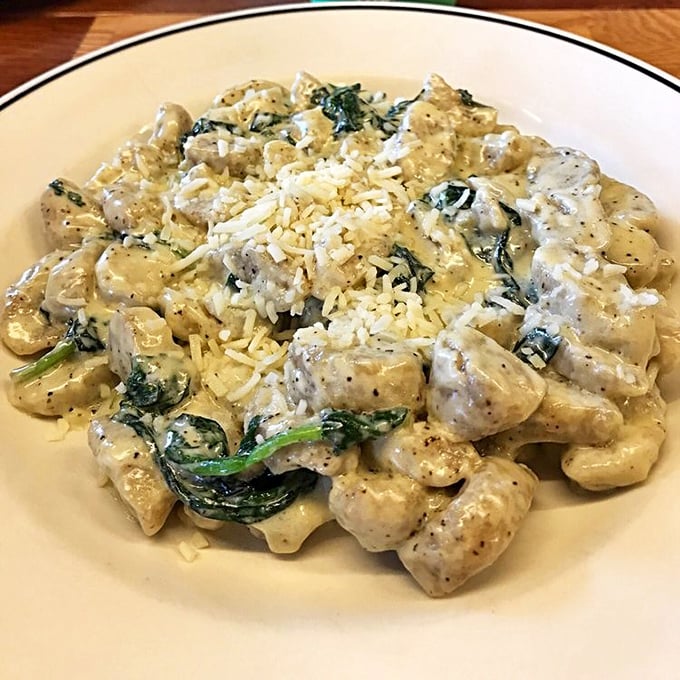 Ricotta gnocchi with spinach that's so light and creamy, you'll want to open a savings account just to fund your next visit.