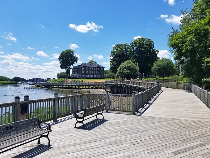Benches along the promenade invite visitors to practice the forgotten art of sitting still while contemplating water that's been flowing since before Twitter arguments existed.