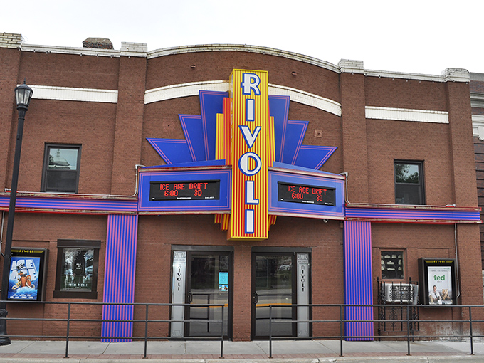 The Rivoli's Art Deco marquee doesn't just advertise movies; it broadcasts nostalgia from an era when going to the cinema was an event worth dressing up for.
