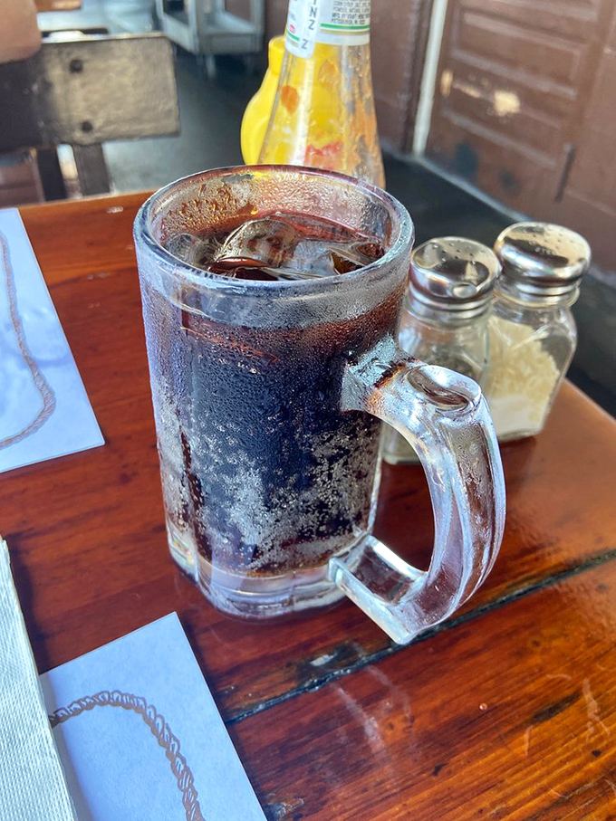 A frosty mug of root beer&mdash;the perfect counterpoint to all that smoky goodness. It's like the universe created carbonation specifically for this moment.