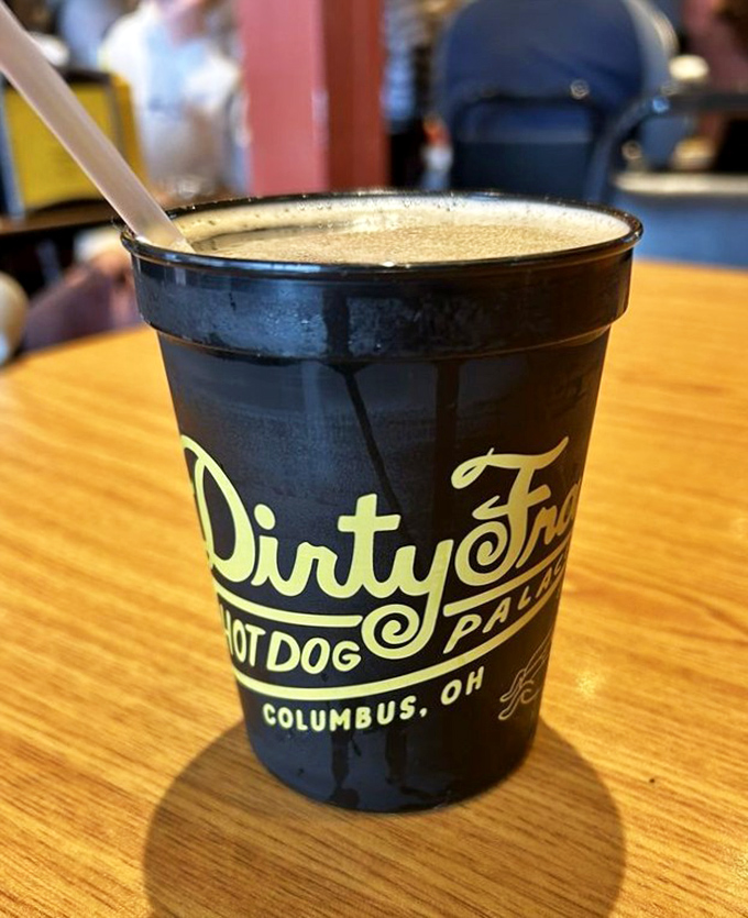 That iconic black cup holds liquid memories&mdash;a root beer that pairs with everything on the menu like they were soul mates in a previous life.