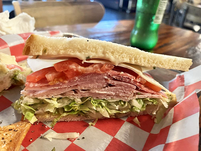 Fresh ingredients stacked with precision &ndash; this sandwich isn't just assembled, it's composed, like a delicious edible symphony on whole grain bread.