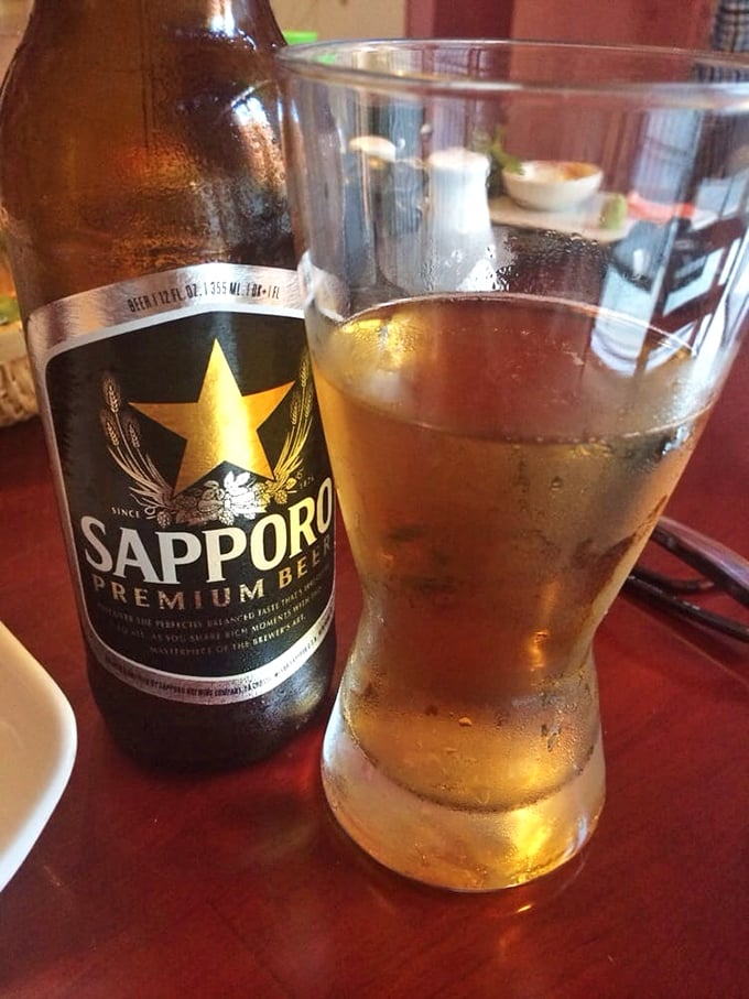 Nothing complements sushi quite like a frosty Sapporo. The beer's crisp finish cuts through rich flavors like a samurai sword through silk.