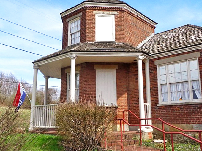 This charming brick building with its quaint porch whispers tales of early American travel. When toll roads were the height of infrastructure innovation!