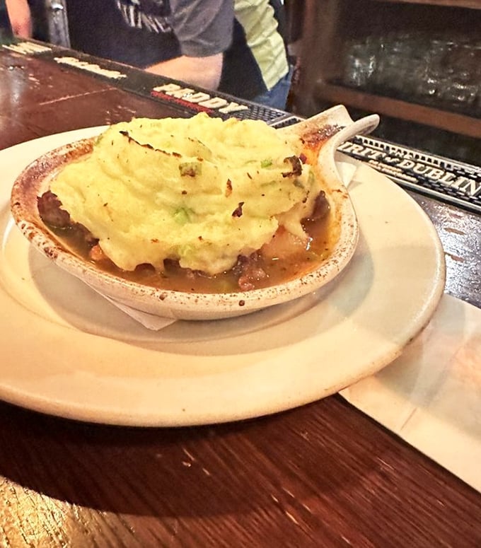 Not just shepherd's pie&mdash;it's a savory lullaby under a cloud of mashed potatoes that's been kissed by fire until golden and irresistible.