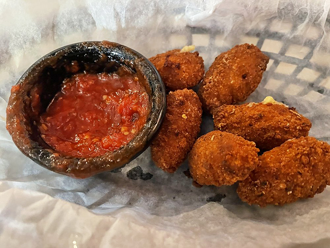 These golden-fried Smokey Bacon Gouda Bites aren't just appetizers—they're little spheres of joy that disappear faster than you can say "just one more."