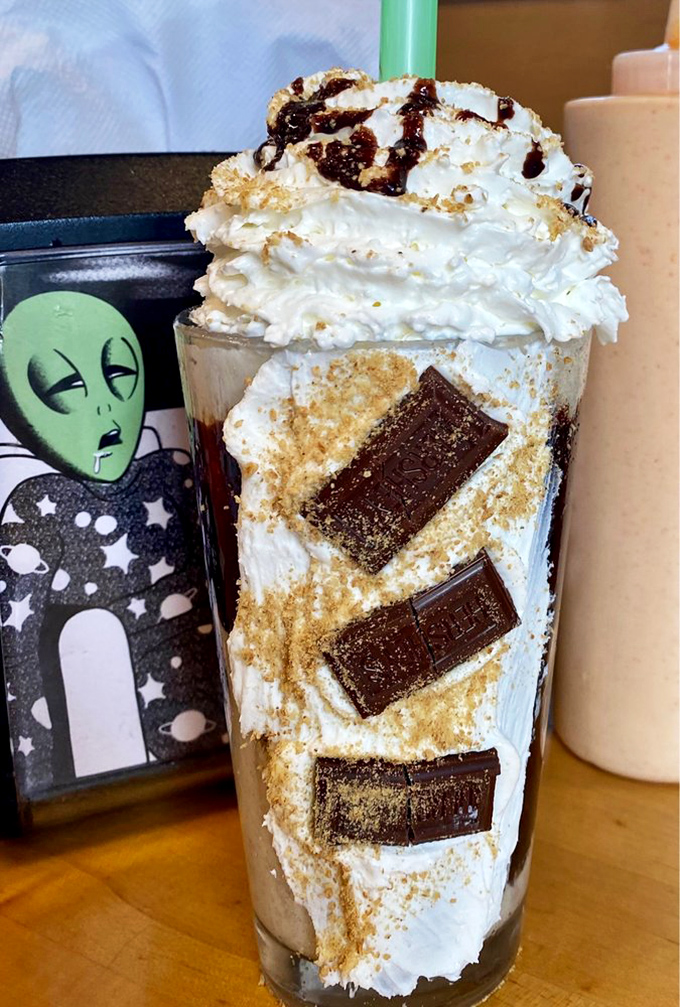 Not all heroes wear capes&mdash;some come in glassware. This s'mores shake, crowned with whipped cream and chocolate, is basically childhood nostalgia in drinkable form.