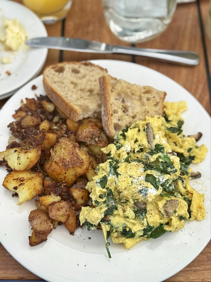Those potatoes deserve their own fan club&mdash;crispy, golden nuggets of breakfast joy alongside eggs that define "perfectly scrambled."