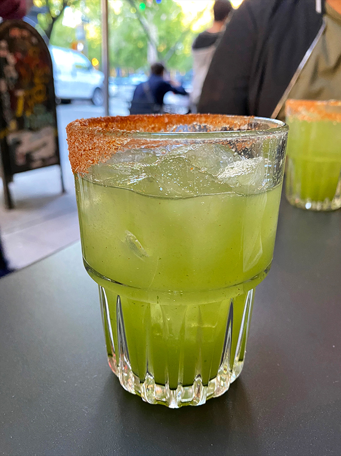 That margarita's electric green glow isn't just for show&mdash;it's nature's way of saying "I contain enough lime to prevent scurvy for months."