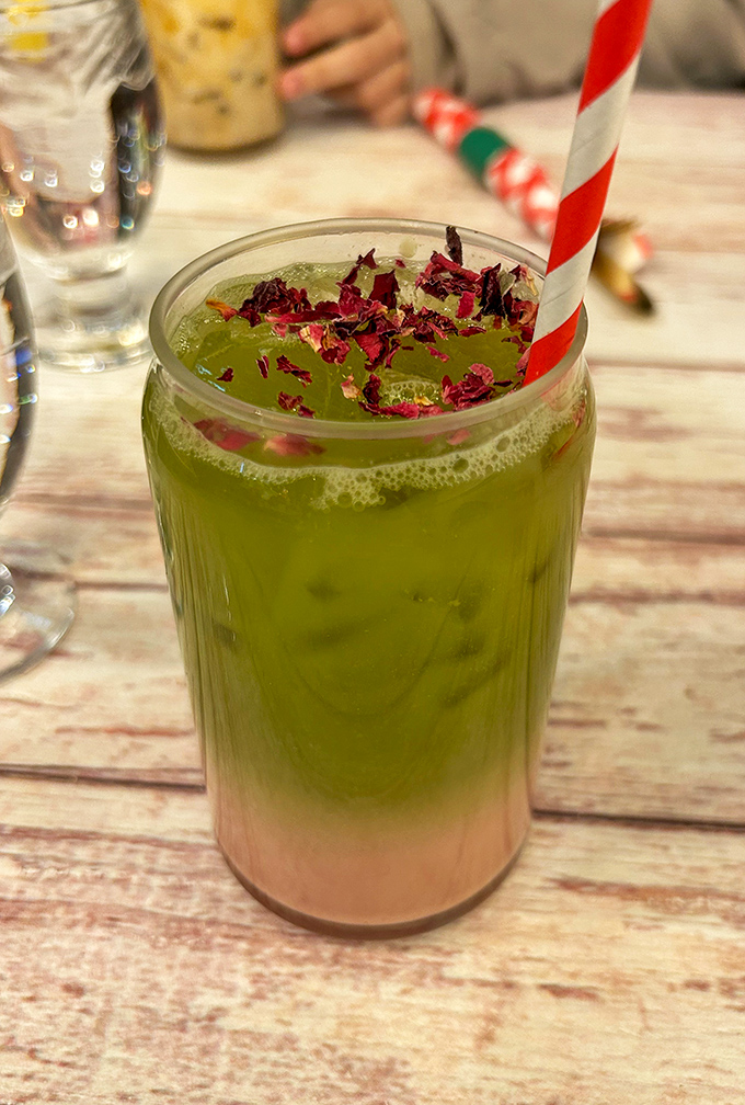 This isn't just a drink; it's summer in a glass&mdash;layered, vibrant, and topped with dried flowers like nature's confetti.