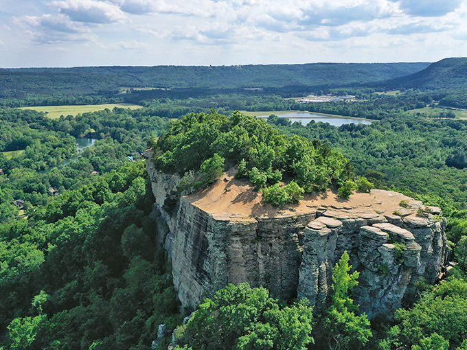 Sugarloaf Mountain rises from Greers Ferry Lake like nature's monument to persistence &ndash; a dramatic limestone bluff that refused to become just another underwater feature.