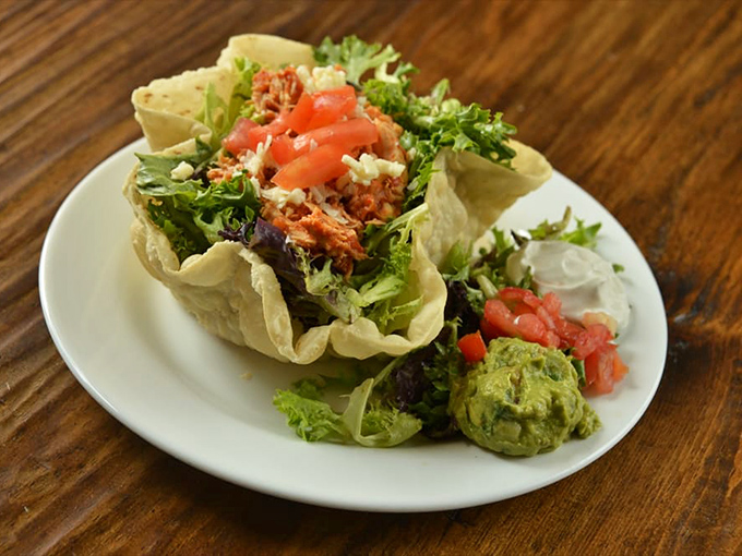 This taco salad isn't just breaking free from its shell&mdash;it's having a full-blown liberation celebration with fresh greens and seasoned protein.