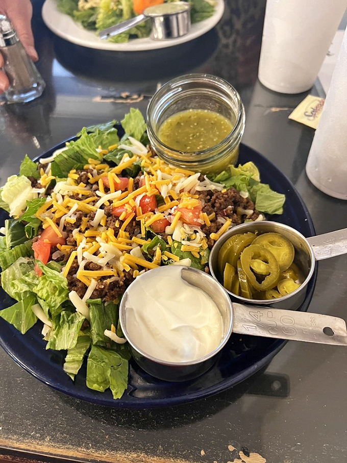 This isn't just a taco salad&mdash;it's a Texas landscape on a plate, complete with mountains of cheese, valleys of sour cream, and jalape&ntilde;o treasures.