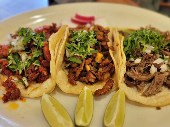 Authentic tacos don't need to shout with excess toppings&mdash;just perfectly seasoned meat, fresh cilantro, diced onion, and lime wedges standing by for duty.