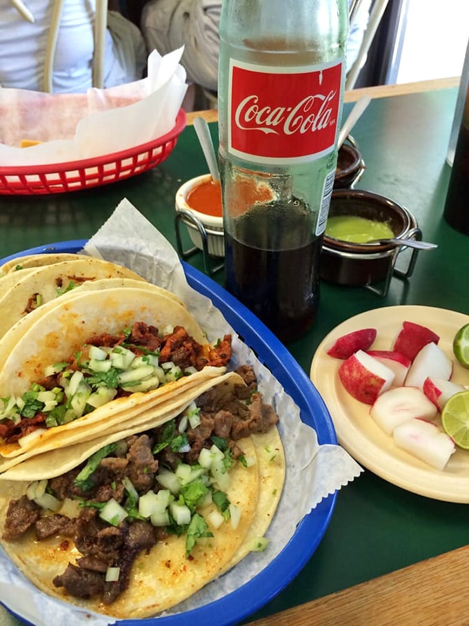 Street tacos done right&mdash;simple corn tortillas cradling perfectly seasoned meat, topped with nothing more than they need: fresh cilantro, onion, and a lime wedge.