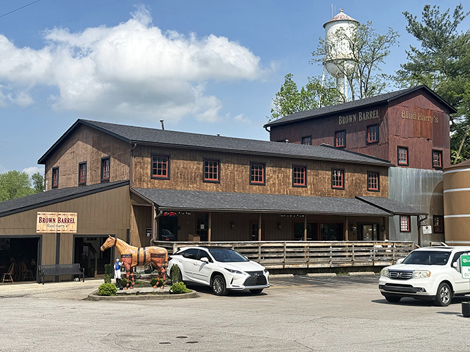 The Brown Barrel's rustic wooden exterior and water tower backdrop offer a quintessential Kentucky experience where bourbon heritage meets small-town charm.