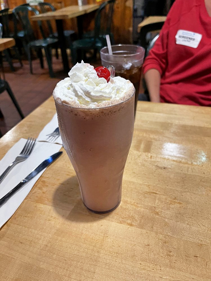 The Candy Man Frappe isn't just a milkshake&mdash;it's a dessert skyscraper topped with enough whipped cream to make a dairy farmer blush.