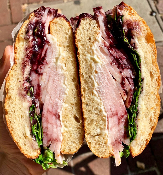 Fresh meets fabulous in this veggie-forward creation. The vibrant greens and creamy spread make healthy eating feel like an indulgence rather than a sacrifice.