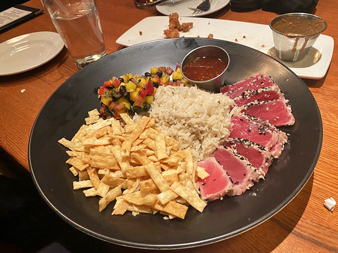 Seared tuna that's still blushing pink in the middle – exactly as nature intended. The kind of dish that makes you feel healthier just looking at it.
