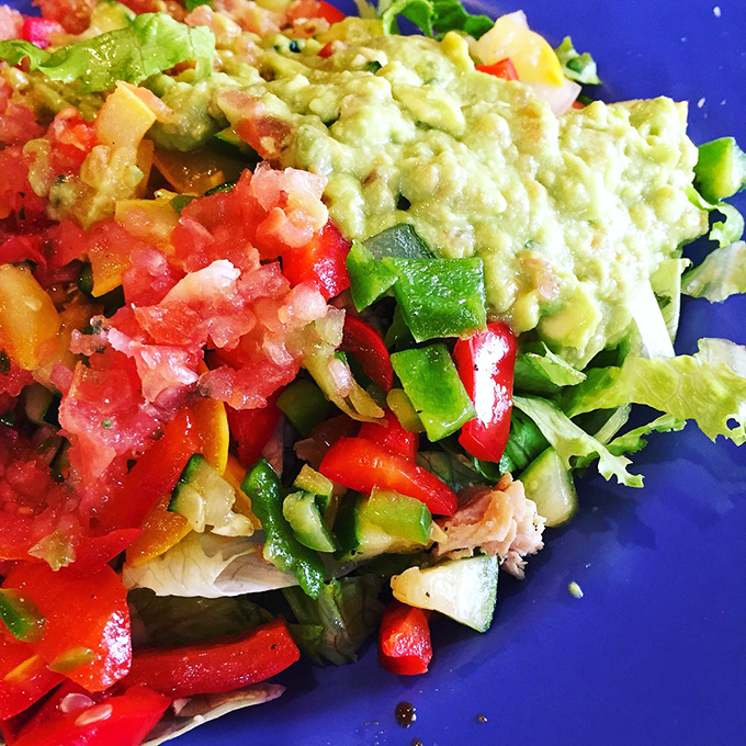 A salad that doesn't apologize for being healthy. This vibrant medley makes eating your vegetables feel like cheating on your diet.