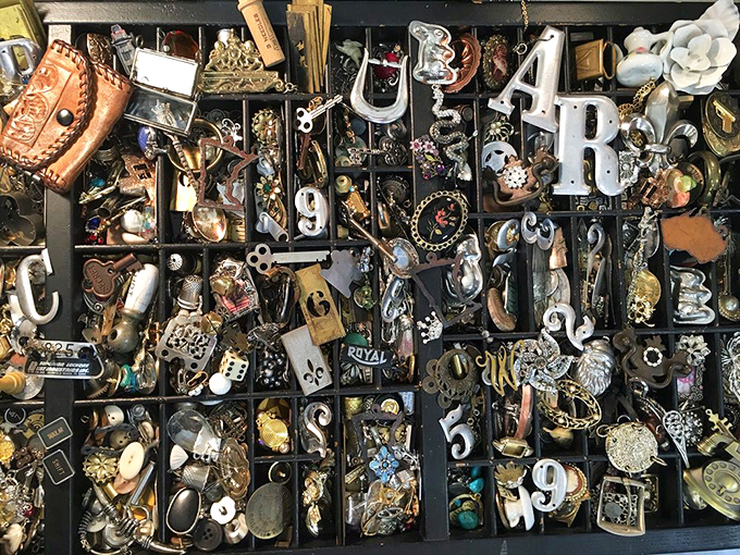 This printer's drawer of trinkets and treasures is like a physical Pinterest board&mdash;each compartment holding someone's future conversation piece.